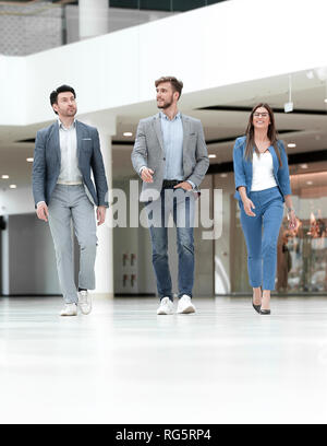 business colleagues are making steady progress on the office lobby ...