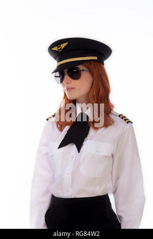 Airline pilot wearing uniform with epauletes using smart phone in ...