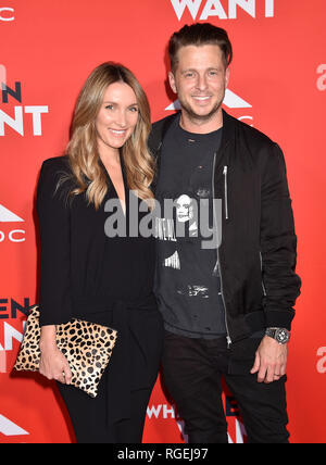 Ryan Tedder and his wife Genevieve Tedder arrive on the red carpet ...