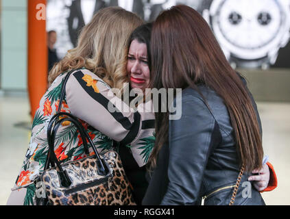 Laura Plummer (centre) at Heathrow Airport following her return to the ...