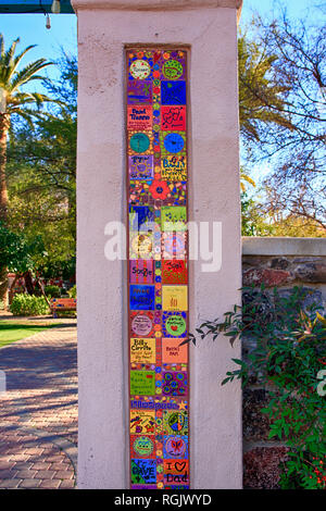 Small ceramic tiles created by past UA students on a column leading to ...