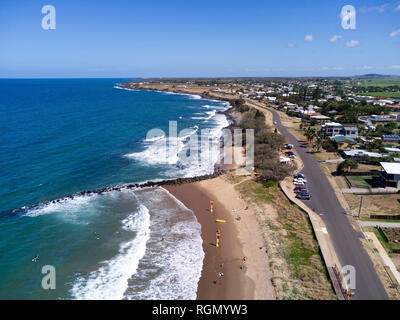 Aerial of a patrolled surf beach at Oaks Beach - Burnett Heads a ...
