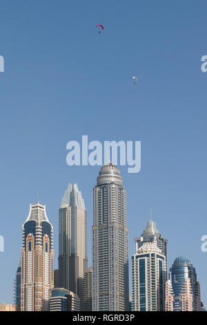 Dubai, United Arab Emirates - tandem skydivers prepare to land back to ...