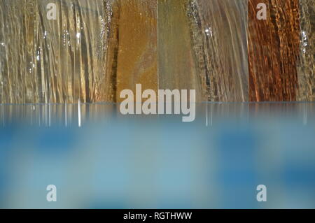 Zoom on a small waterfall from a Swimming pool Stock Photo - Alamy