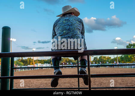 A professional rodeo clown or bullfighter in his colorful outfit at a ...