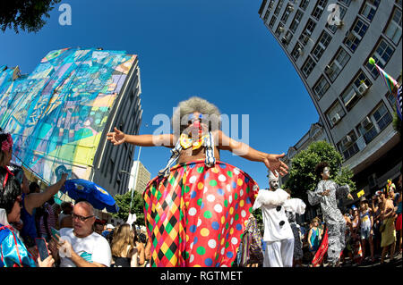 Revelers perform during a pre-Carnival street party in Rio de Janeiro ...