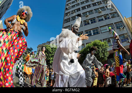 Revelers perform during a pre-Carnival street party in Rio de Janeiro ...