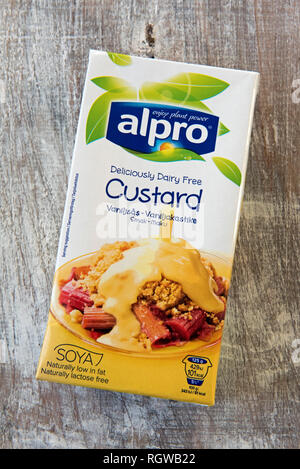 Vegan Alpro Dairy Free Soya Vanilla Custard Vegan Logo Stock Photo - Alamy