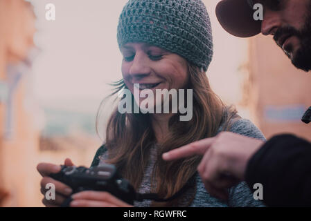 Woman laughing with camera in the street Stock Photo - Alamy