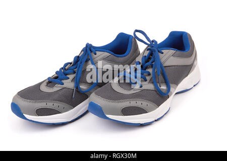Pair of running shoes over the white background Stock Photo - Alamy