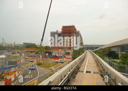 The Changi Airport Skytrain is a people mover system that connects ...
