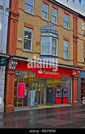 Business, Finance, Banking, red Santander sign and logo on a high ...