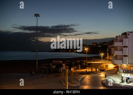 Albufeira City Center at Night with view of Ocean and beach. Portugal ...