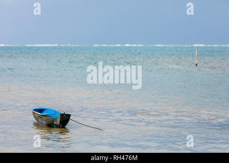 A small boat off the coast of Punta Sur on Isla Mujeres, Mexico Stock ...