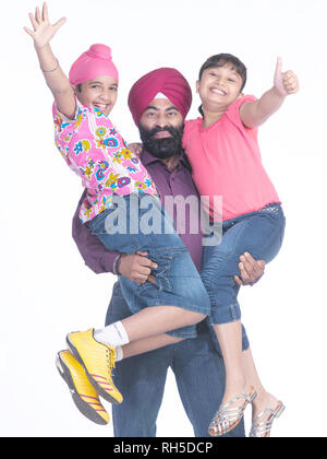 PORTRAIT OF A SIKH SARDAR WITH HIS SON AND DAUGHTER Stock Photo - Alamy