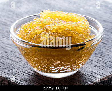 Pike caviar or roe in the bowl on wooden background Stock Photo - Alamy