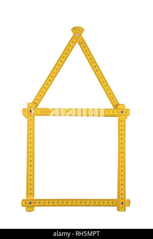 Yellow meter ruler folded as house isolated on white background Stock ...