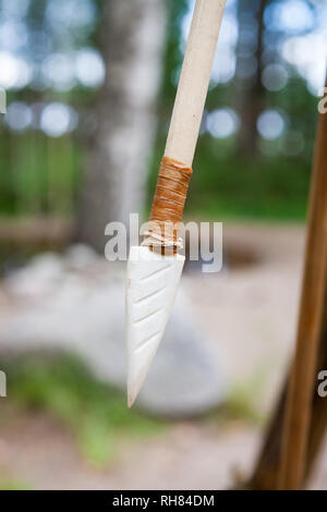 prehistoric stone age bone arrow tip over white background Stock Photo ...
