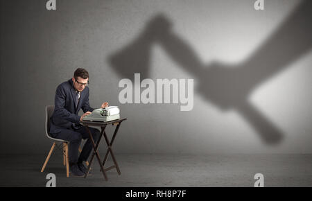 Shadow threatening hard worker man who is afraid Stock Photo - Alamy