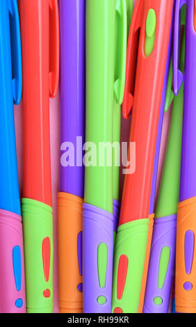 many Ball Pen on Pink Background Stock Photo - Alamy