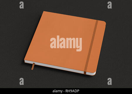 Brown square notebook with elastic band on white background Stock Photo ...