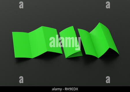 Blank green trifold paper leaflet on black background. Six pages, three ...