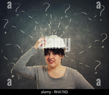 engineer construction worker woman doubt expression Stock Photo - Alamy
