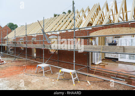 Timber frame house extension or annexe under construction with modern ...