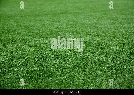 A green Astro turf background Stock Photo - Alamy