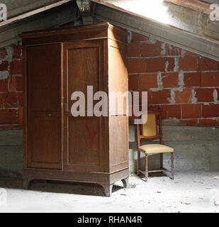 broken wooden wardrobe in the attic of an old house Stock Photo - Alamy