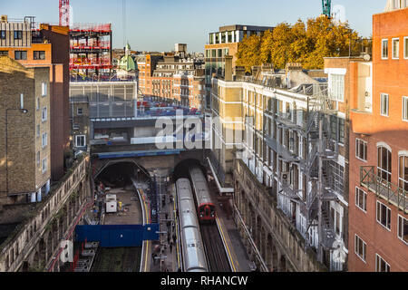 Barbican Station underground tube station train and man person commuter ...