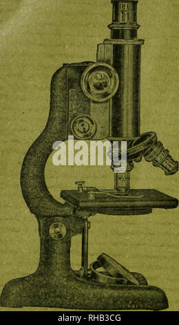 Nosepiece of a microscope with objectives Stock Photo - Alamy