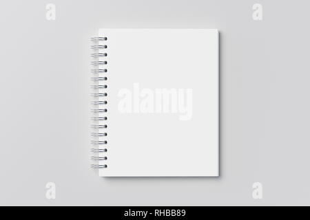 Blank vertical spiral notepad on white background. With clipping path ...