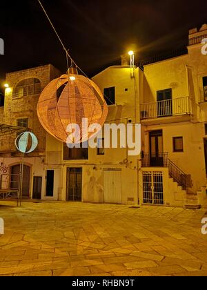 Night view of the main square of Cisternino with Christmas decoration ...
