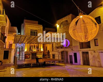 Night view of the main square of Cisternino with Christmas decoration ...