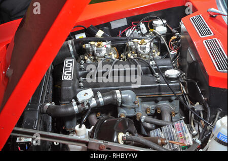 Lotus twin cam engine with red cylinder head in the engine compartment ...