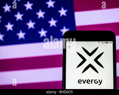 Evergy Electric services company logo seen displayed on smart phone ...