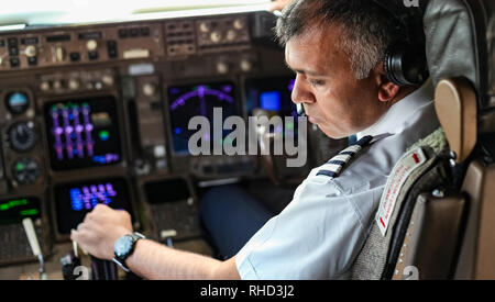 Over the Shoulder of a Indian Pilot in a Jumbo Cockpit Stock Photo - Alamy