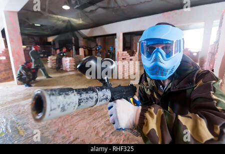 Player in blue mask is targeting in opponent in battlefield in ...