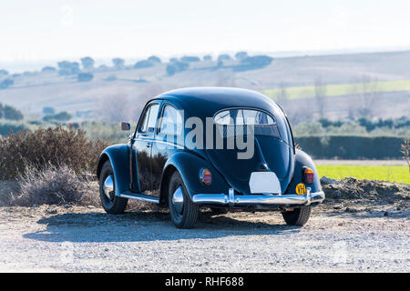 Black Volkswagen Beetle from rear in studio Stock Photo - Alamy