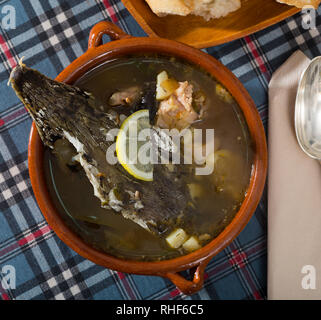 Fish soup with sturgeon in pottery Stock Photo - Alamy