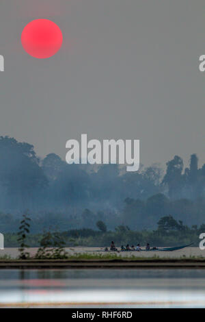 pink smoky sunset over water Stock Photo - Alamy