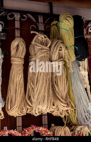 Bundle of linen rope in a market place Stock Photo - Alamy