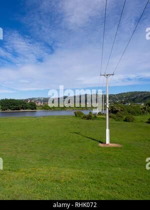 New power pole on the background of clouds Stock Photo - Alamy