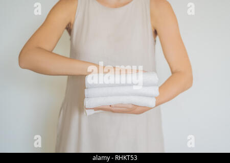 Closeup shot of a blue hotel’s room key card isolated on a wooden ...