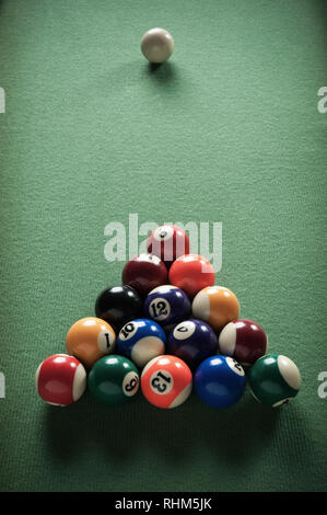 billiard table with green material and billiard balls Stock Photo - Alamy