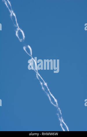 An unusual aircraft contrail Stock Photo - Alamy