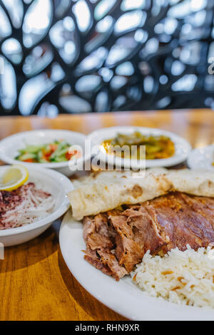 Doner kebap with rice and salads Stock Photo - Alamy