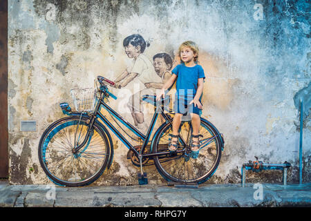 Two Kids on a Bicycle mural by Ernest Zacharevic, Lebuh Armenian (Armenian Street), old Colonial ...