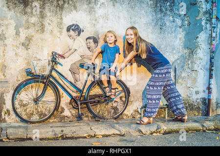 Two Kids on a Bicycle mural by Ernest Zacharevic, Lebuh Armenian (Armenian Street), old Colonial ...